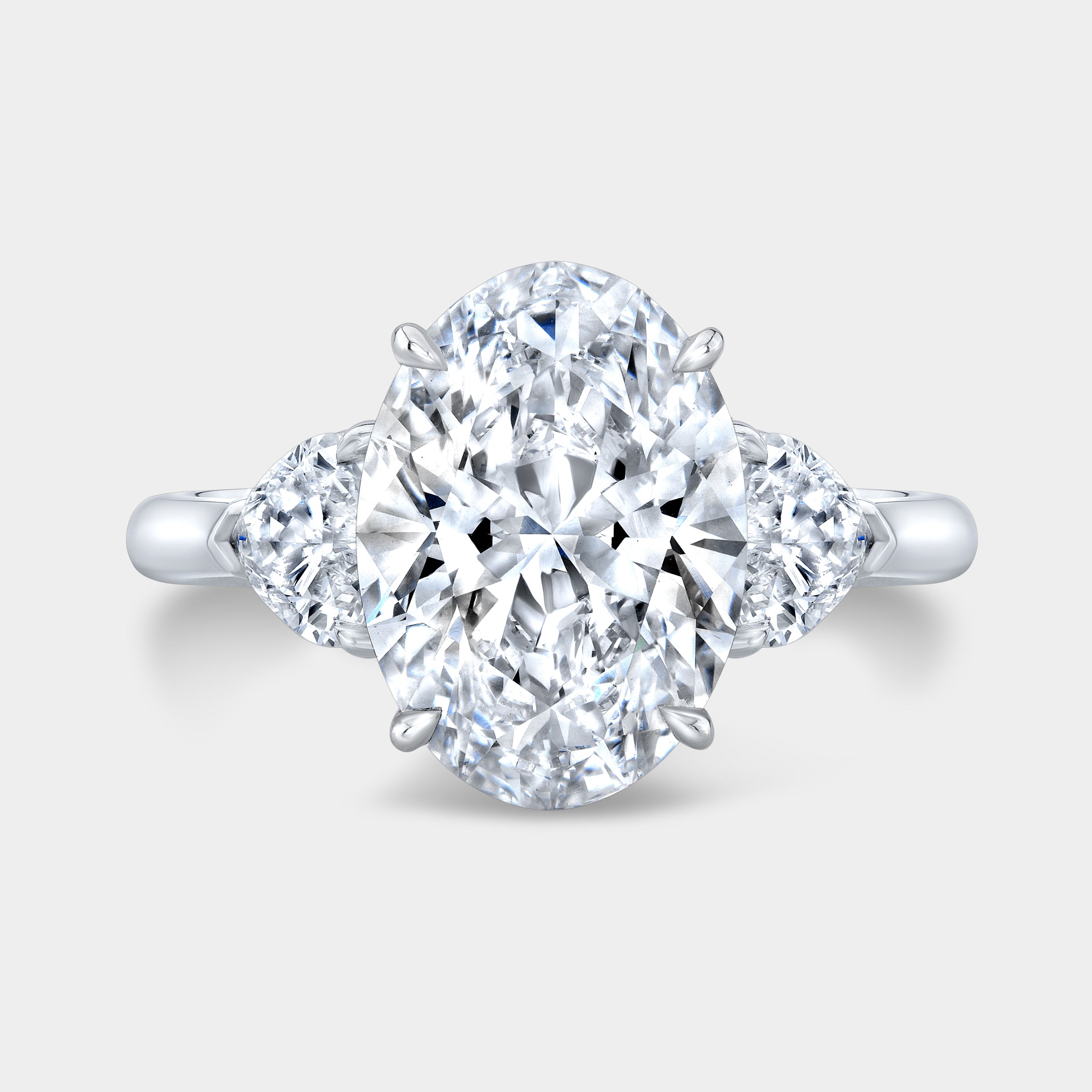 Oval Diamond with Heart Shape Diamond 3 Stone Platinum Engagement Ring ...